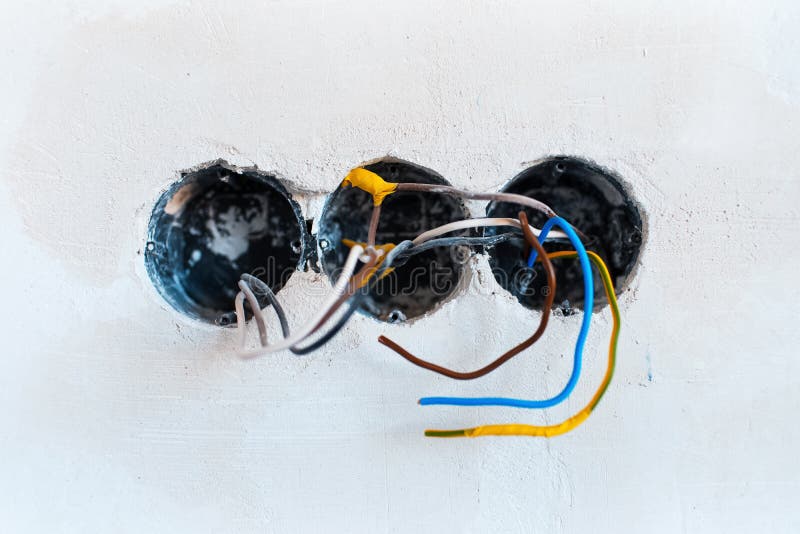 Close-up Picture of Three Socket Holes of Electrical Plugs with ...