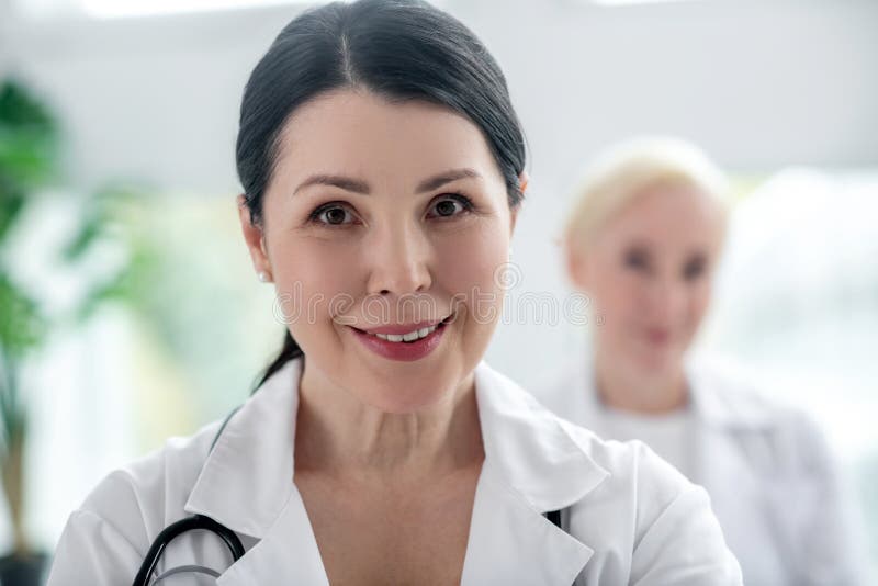 Close Up Picture of Two Female Doctors Stock Photo - Image of medical ...