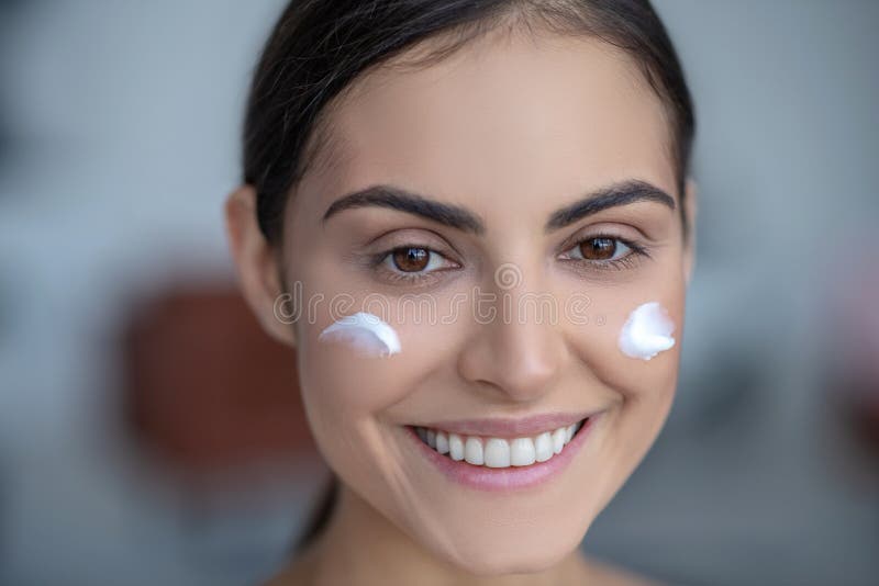 Close Up Picture of Womans Face with Cream on Cheeks Stock Image ...