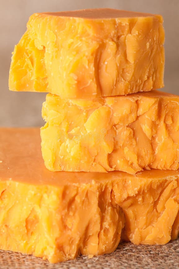Close Up Pieces of Red Cheddar Cheese Stock Image - Image of aged ...