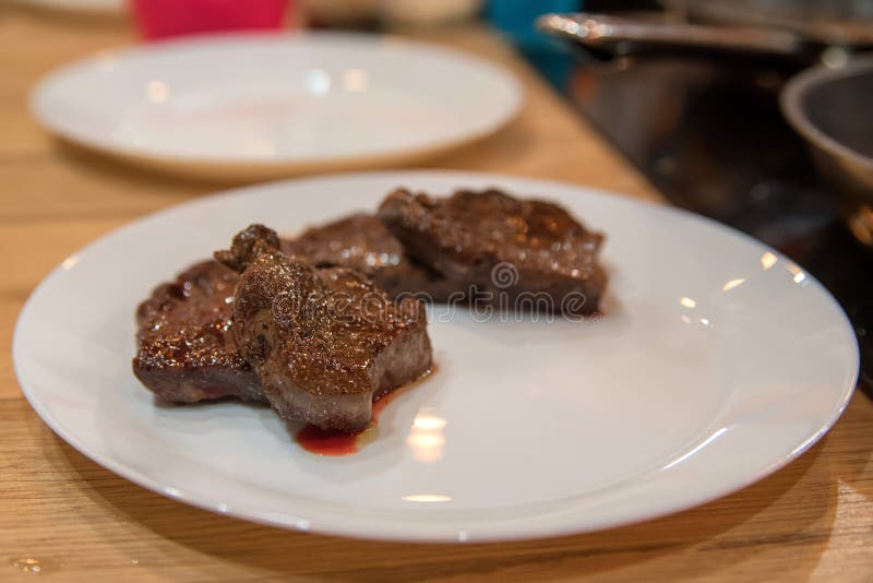 Close Up Pieces of Roasted Beef on Plate Stock Photo - Image of gourmet ...