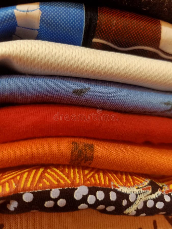A Stack of Ironed and Folded Clothes Stock Photo - Image of cotton ...