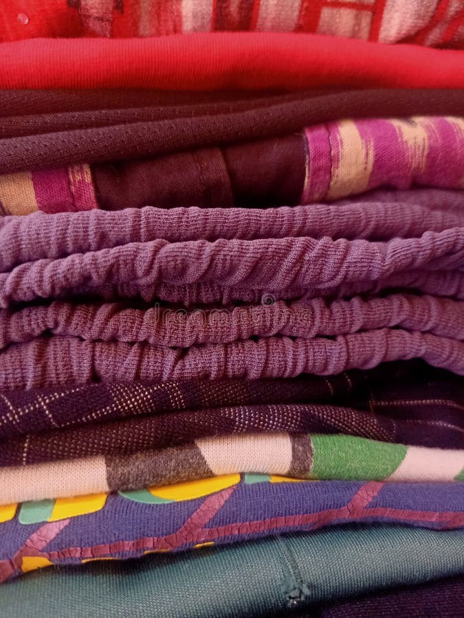Close Up of a Pile of Assorted Ironed and Folded Clothes Stock Photo ...