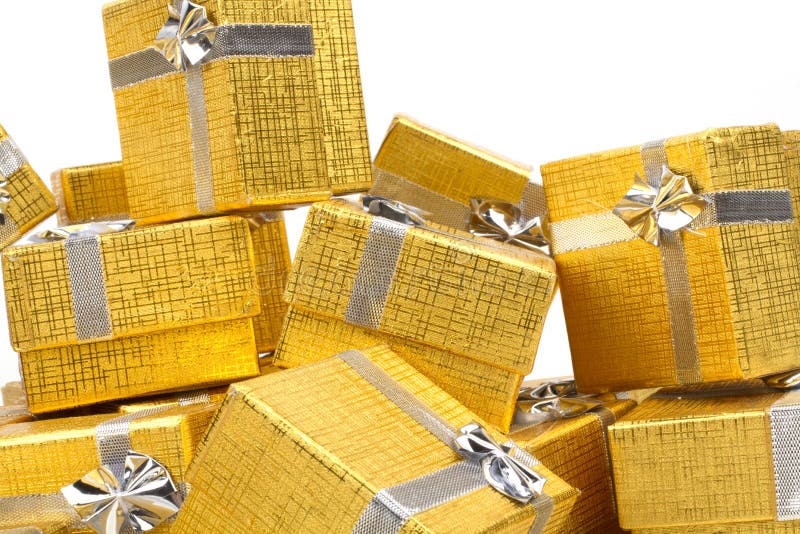 Close Up of a Pile of Gold Gifts on White Stock Photo - Image of ...
