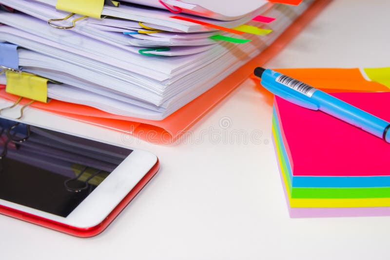 Close-up of a Pile of Paper with Colored Post Its and a Pen. Stock ...