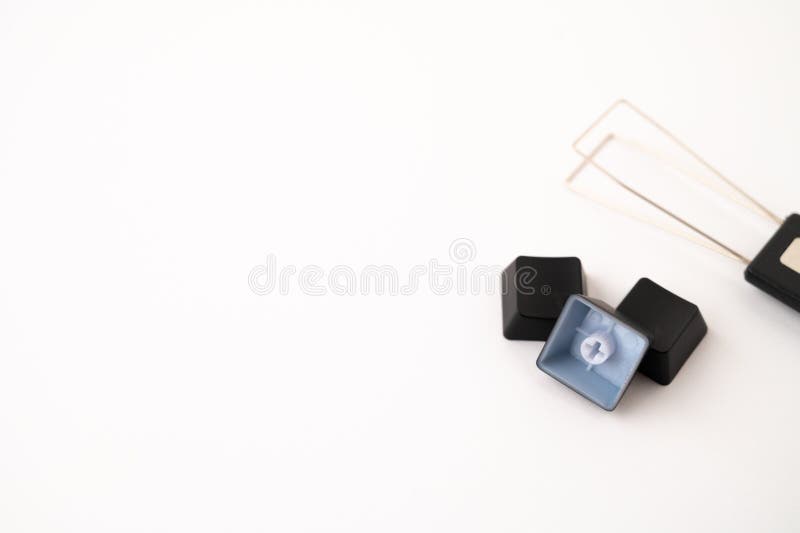 A Close-up of a Pile of Three Detached Mechanical Keyboard Keycaps ...