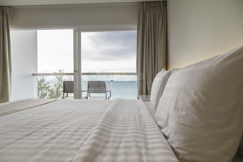 Close Up Pillows and Bed View from Deluxe Room Stock Image - Image of ...