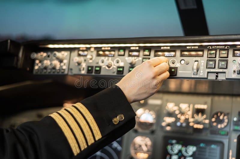 Close-up of a Pilot& X27;s Hand on an Airplane Control Panel. Stock ...