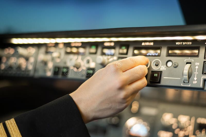 Close-up of a Pilot& X27;s Hand on an Airplane Control Panel. Stock ...