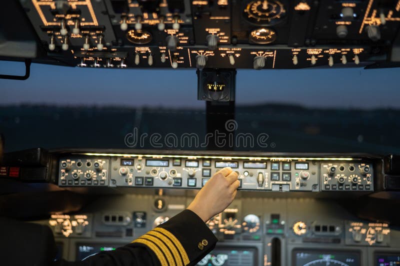 Close-up of a Pilot& X27;s Hand on an Airplane Control Panel. Stock ...