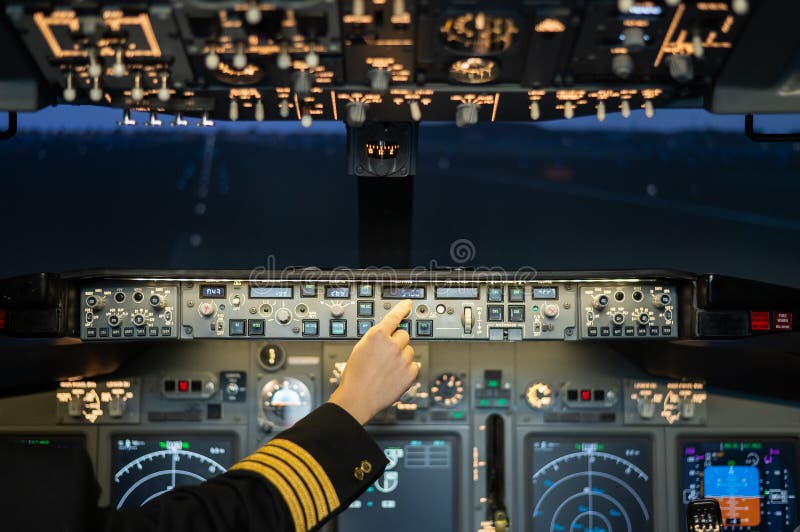 Close-up of a Pilot& X27;s Hand on an Airplane Control Panel. Stock ...