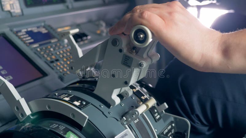 Close Up of Airplane Pilot`s Hand Regulating Thrust Lever Handle for ...