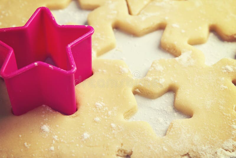 Close Up of Pink Cookie Cutter in Dough Stock Photo - Image of star ...