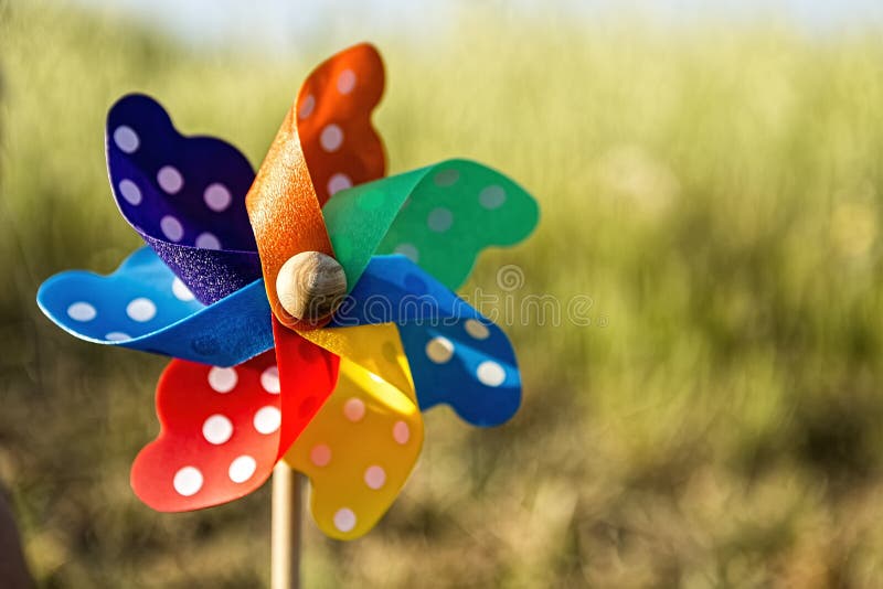 Close Up of a Pinwheel on the Grass (soft Focus). Stock Image - Image ...