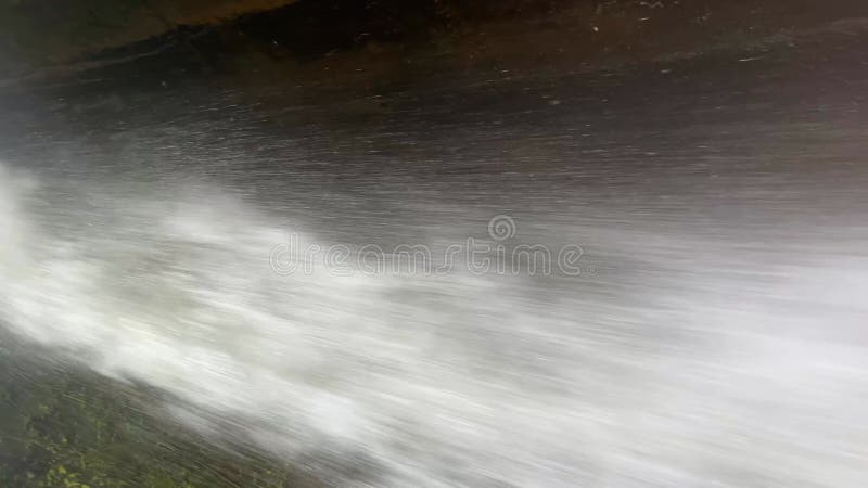 Close-up Plan View from Below a Powerful Fast-flowing Waterfall ...