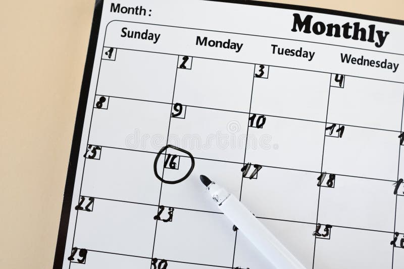 Close-up of a Planner with a Mark on a Beige Background Stock Image ...