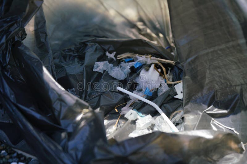 Close-up of Plastic Garbage in a Trash Bag, Drinking Straw Stock Photo ...