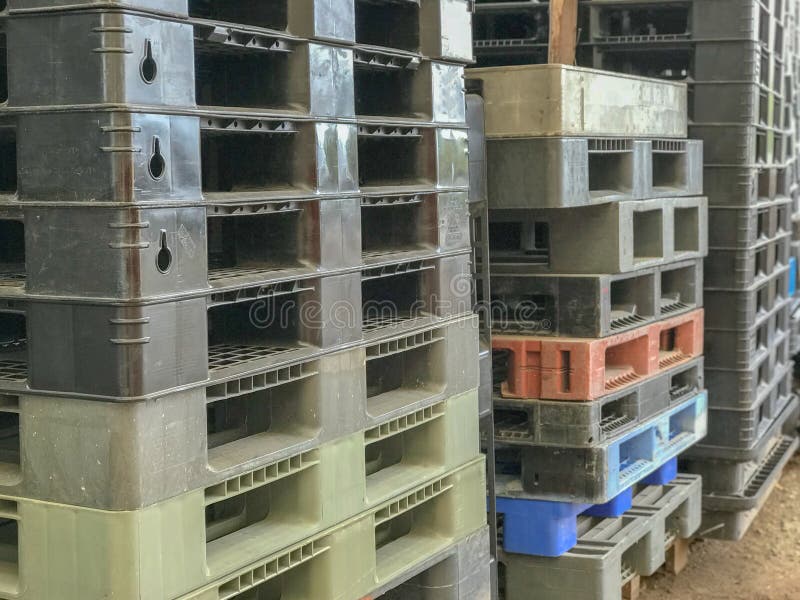 Plastic Pallets Stacked in a Warehouse Stock Image - Image of bottle ...