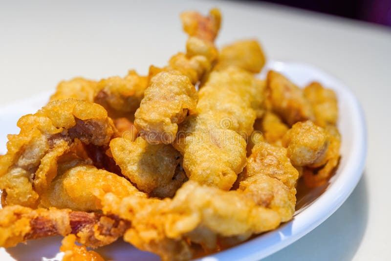 Close-up of a Plate of Delicious Little Crispy Meat Stock Image - Image ...
