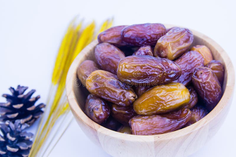 Close Up of a Plate of Dried Dates on a Black Background. Stock Photo ...