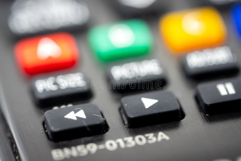 Close-up of the Play Button of a TV Remote Control Stock Photo - Image ...