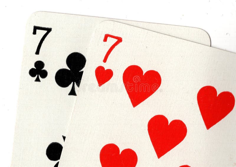 Close Up of Playing Cards Showing a Pair of Sevens. Stock Image - Image ...