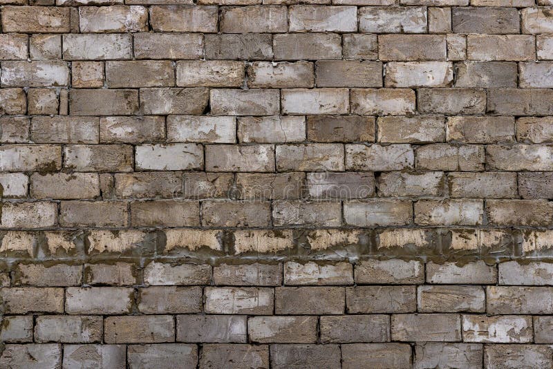 Rough Brick Wall with Minimal Mortar and Cracked Bricks Stock Image ...
