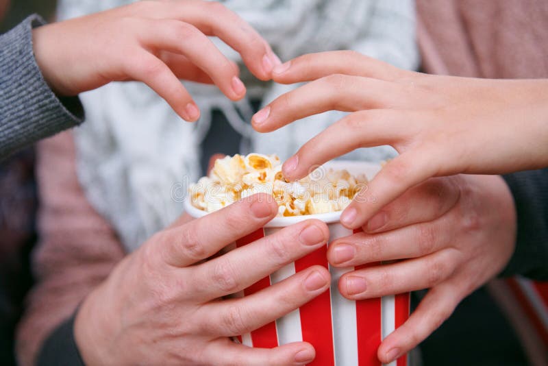 Close-up of Popcorn and Hands Stock Image - Image of classic, white ...