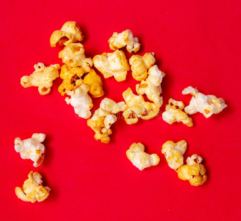 Close-up of Popcorn on a Red Background Stock Photo - Image of macro ...