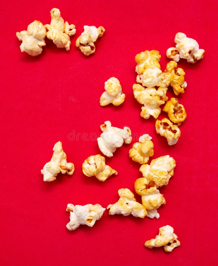 Close-up of Popcorn on a Red Background Stock Photo - Image of snack ...