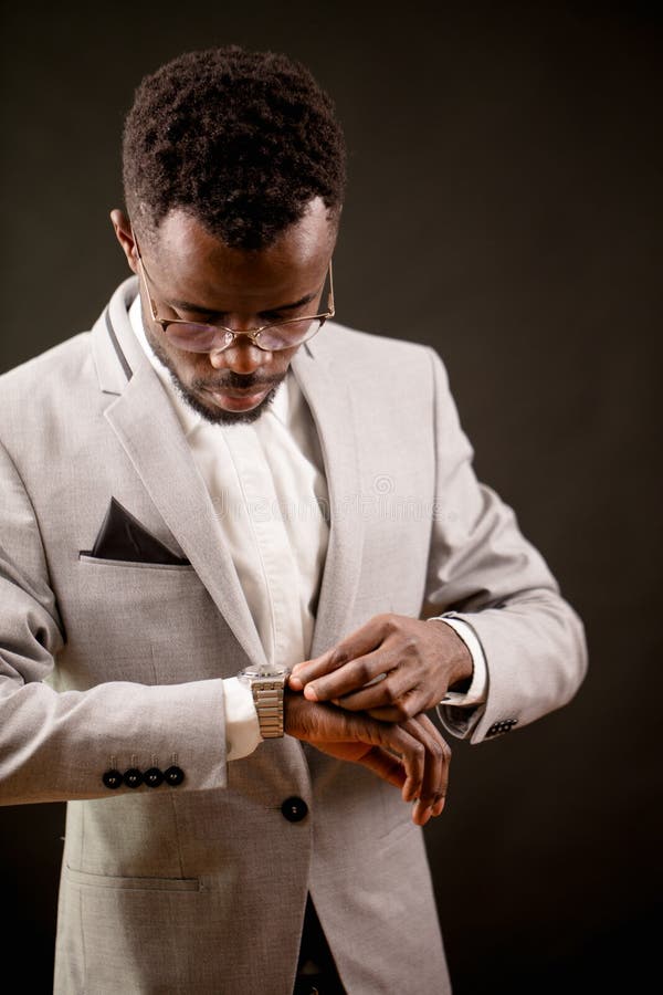 Close Up Portrait of Afro Guy Putting on Watch on Arm Stock Photo ...