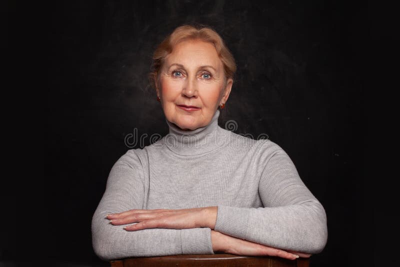 Close Up Portrait Of A Beautiful Senior Woman Looking At The Camera