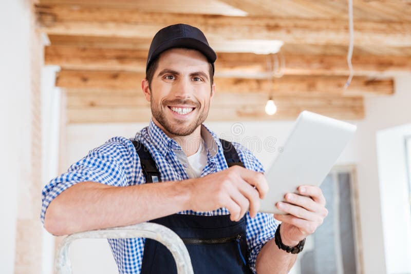 Close-up Portrait of a Builder Holding Pc Tablet Computer Stock Photo ...