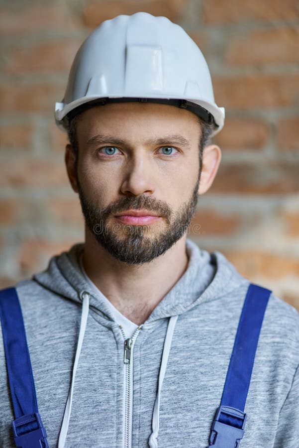 Close Up Portrait of Confident Attractive Young Male Builder in Hard ...