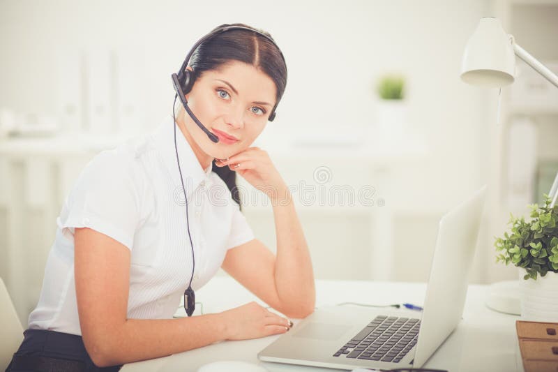 Close-up Portrait of a Customer Service Agent Sitting at Office Stock ...