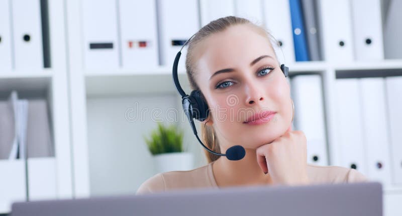 Close-up Portrait of a Customer Service Agent Sitting at Office. Stock ...