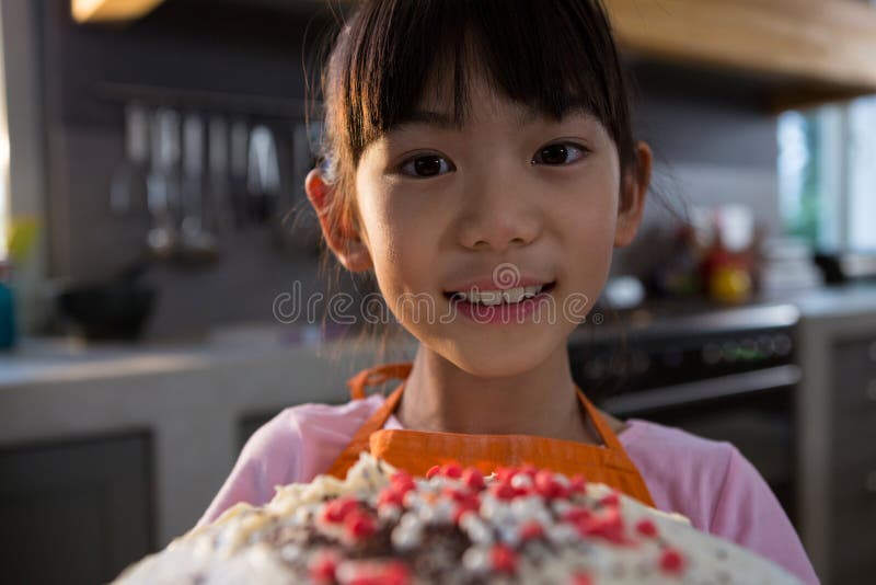 Close-up Portrait of Girl with Cake in Kitchen Stock Photo - Image of ...