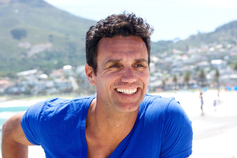 Close Up Portrait of a Good Looking Middle Aged Man Smiling Stock Image ...