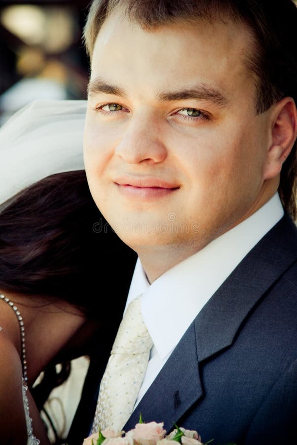 Close-up Portrait of a Groom Stock Photo - Image of couple, cute: 13185506