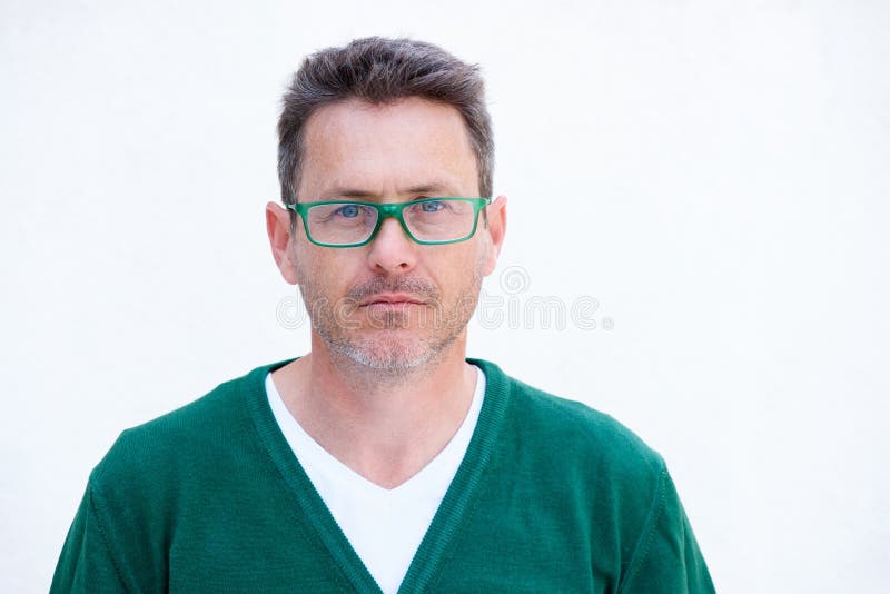 Close Up Handsome Older Man With Glasses Standing And Thinking Stock