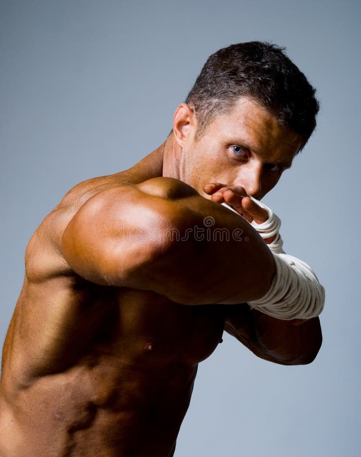 Close-up Portrait of a Kick-boxer in a Fighting Stance. Stock Photo ...
