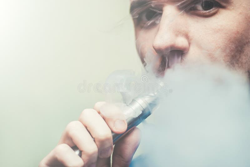 Close Up Portrait of a Man Vaping. Stock Image - Image of cloud ...