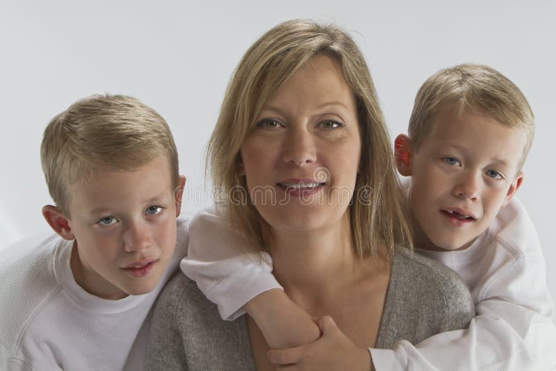 Close Up Portrait of Modern Mom with Two Twin Boys Stock Image - Image ...