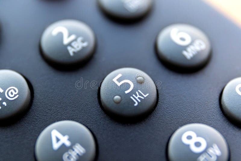 A Close Up Portrait of the Numeric Buttons of a Television Remote ...