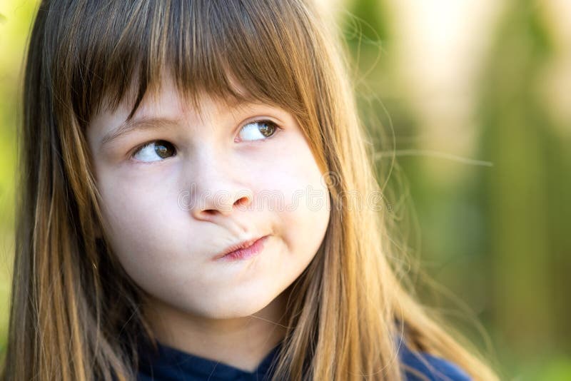 Close Up Portrait of Pensive Cute Brunette Child Girl in Park Stock ... Close Up Portrait of Pensive Cute Brunette Child Girl in Park Stock ...
