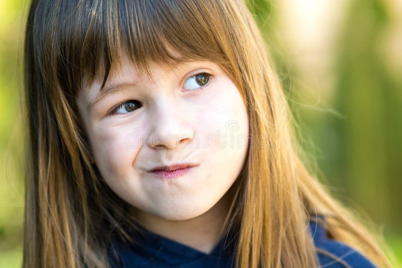 Close Up Portrait of Pensive Cute Brunette Child Girl in Park Stock ... Close Up Portrait of Pensive Cute Brunette Child Girl in Park Stock ...