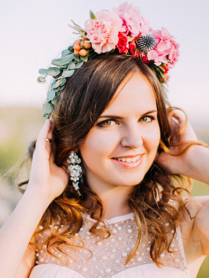 Close-up Portrait of the Pretty Smiling Bride Sorting Hair. Stock Photo ...