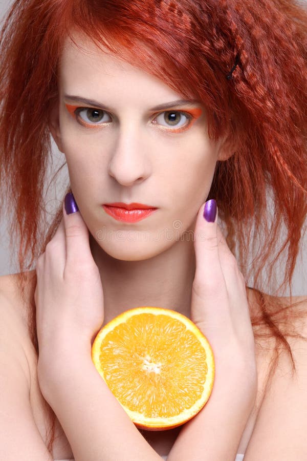 Close Up Portrait of Redhaired Woman with Orange Half Stock Image ...