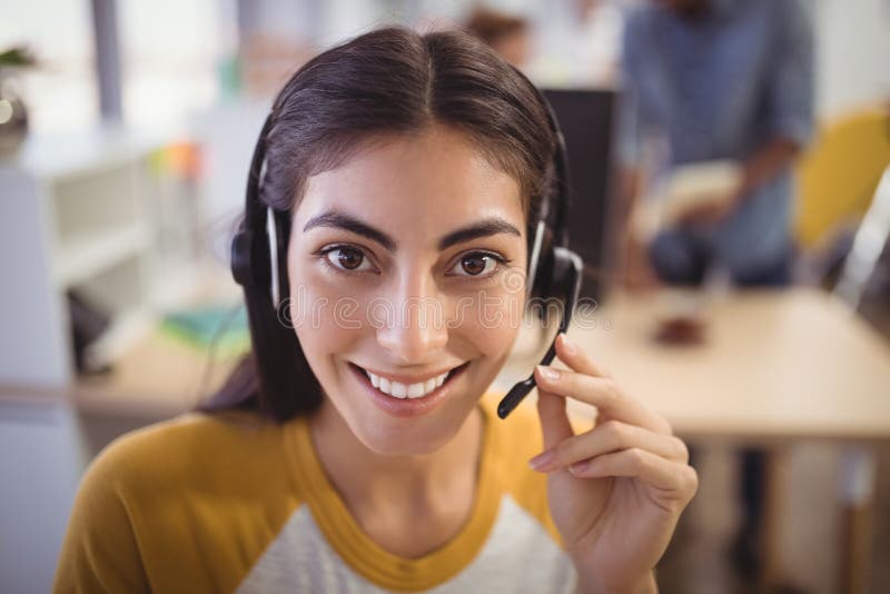 Close Up Portrait of Smiling Female Customer Service Representative ...