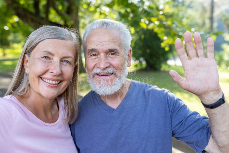 Close Up Portrait Of A Smiling Senior Gray Haired Couple Of A Man And A